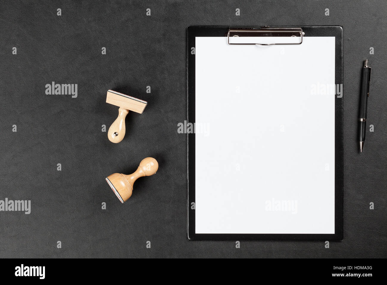Black clipboard on a table Stock Photo - Alamy