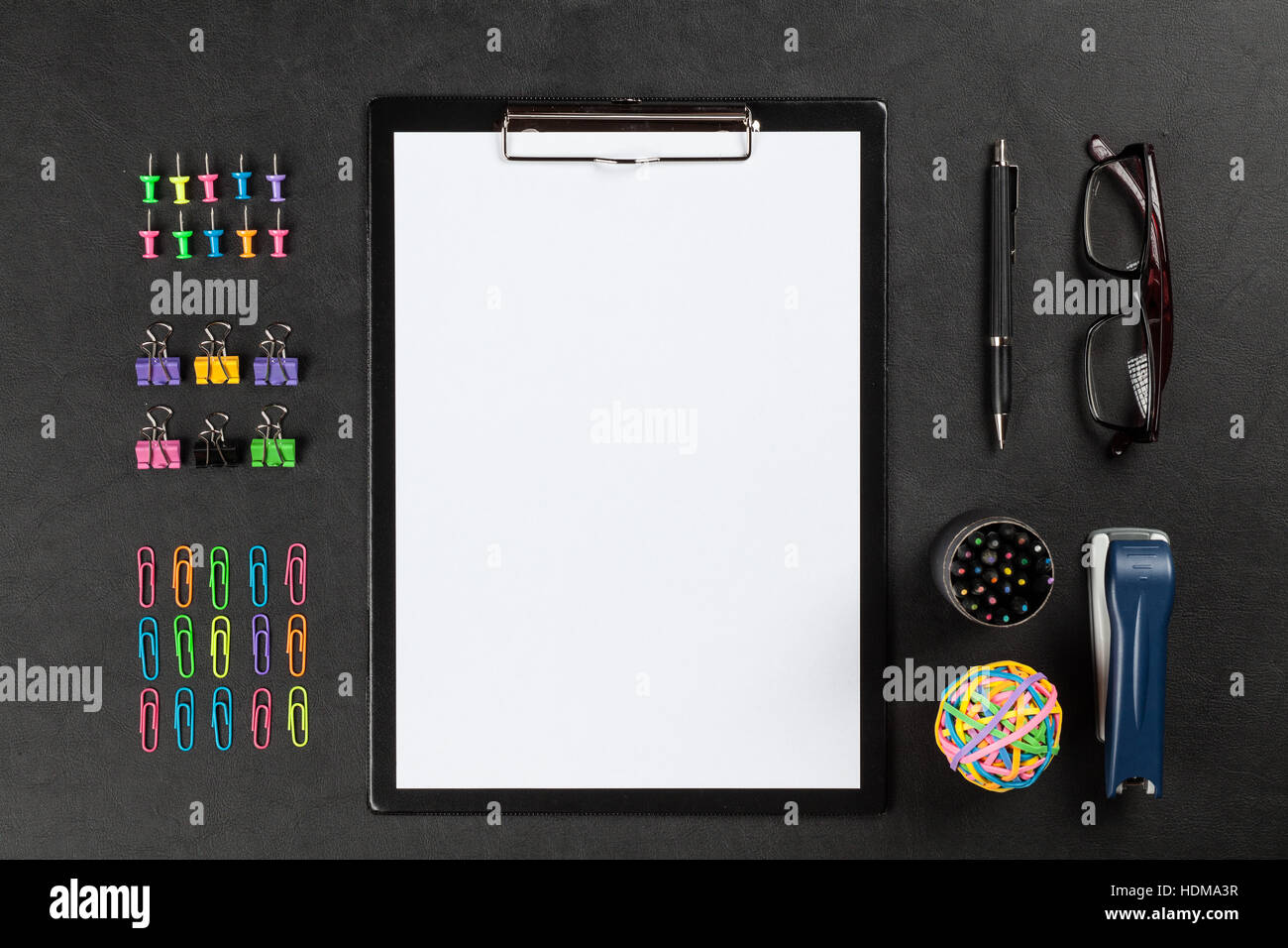 Black clipboard on a table Stock Photo - Alamy