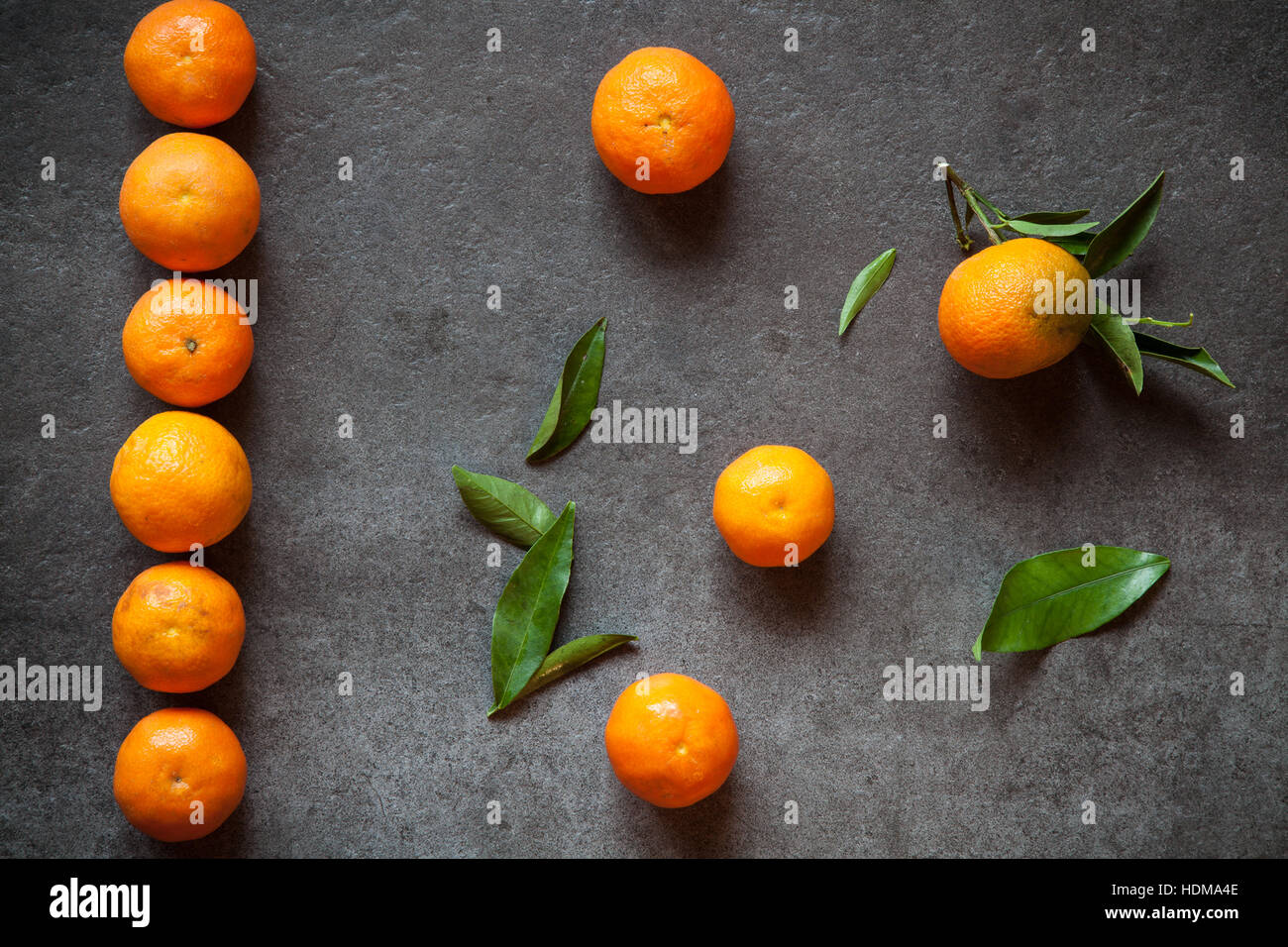 Fresh tangerines with leaves Stock Photo - Alamy