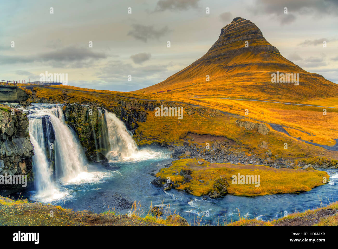 Mt Kirkjufel and Kirkjufelsfoss waterfall near Grundarfjordur in ...