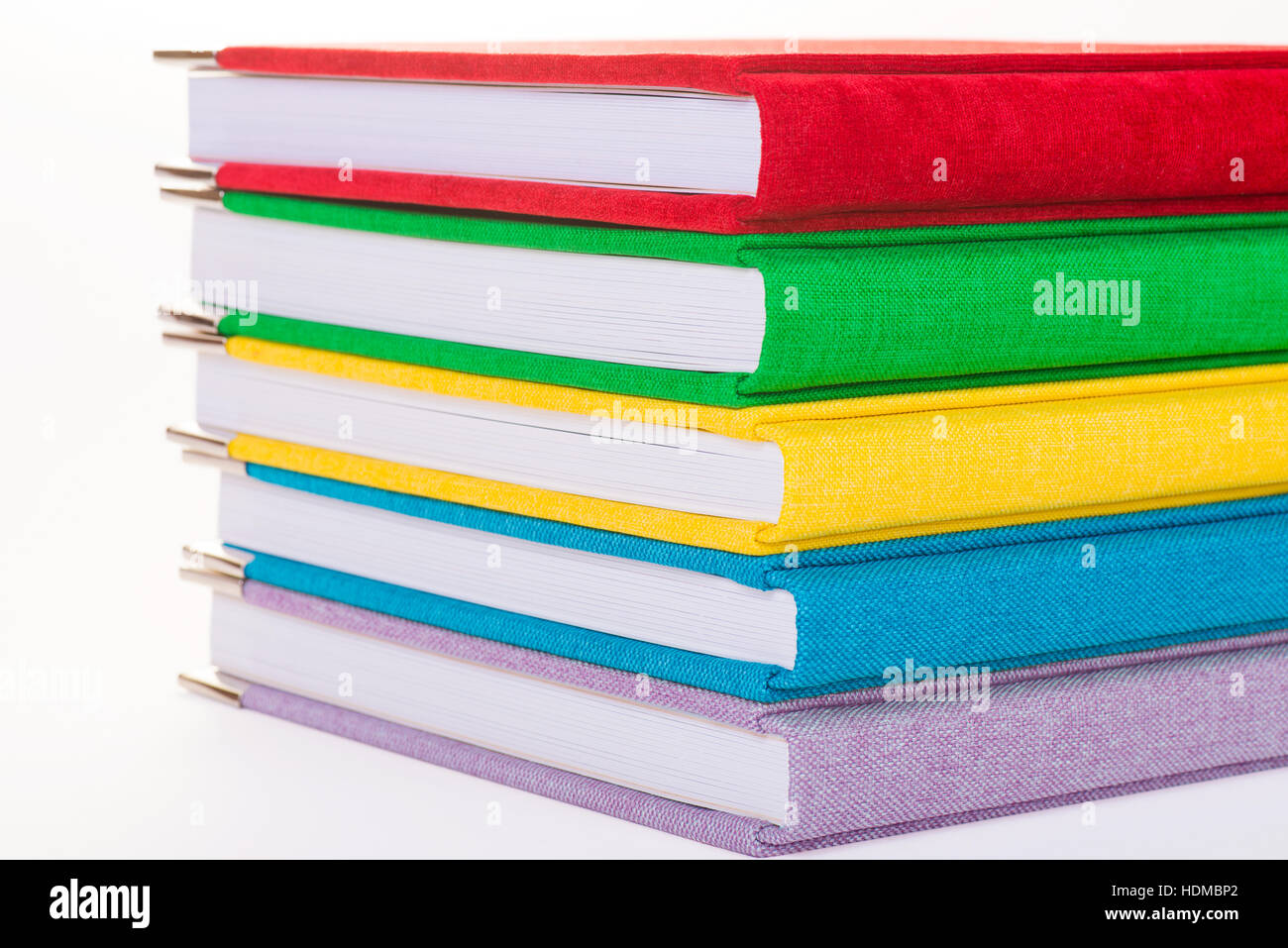 Multicolored book textile cover. Photobooks on a white background Stock ...