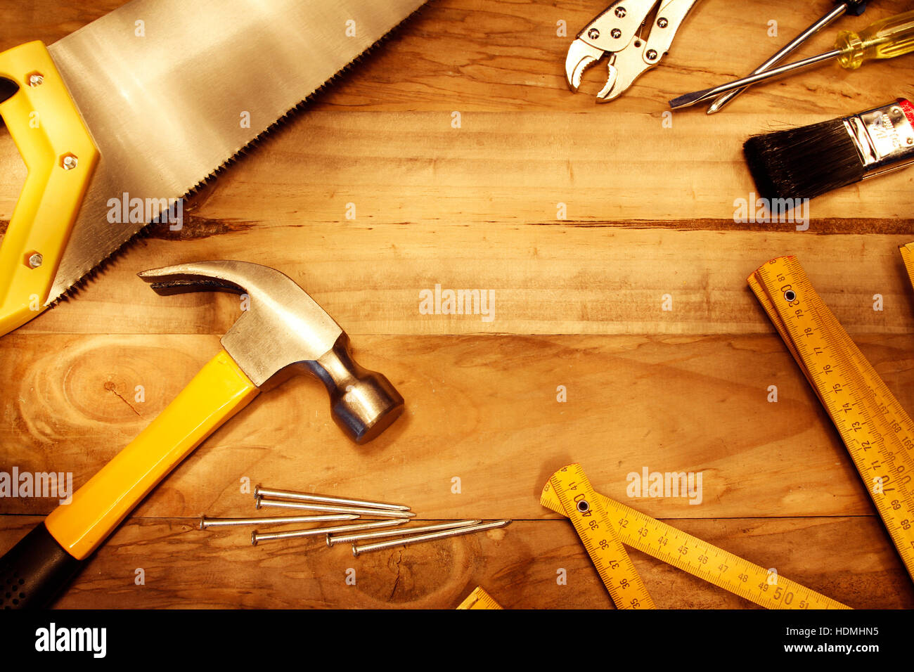 Assorted work tools on wood Stock Photo - Alamy