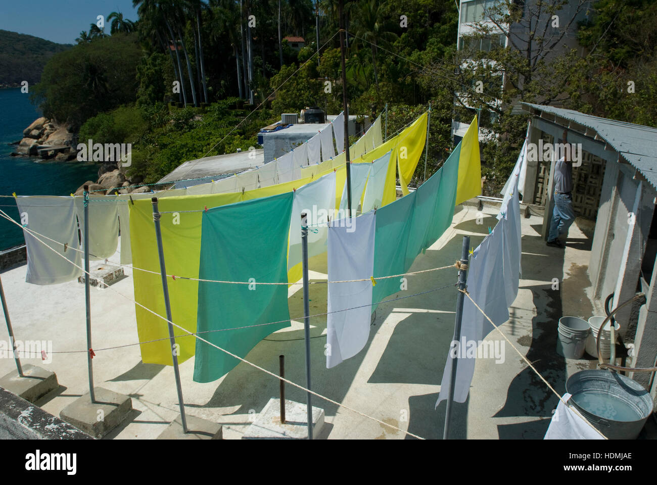 Colorful laundry hanging by the ocean in Mexico Stock Photo - Alamy