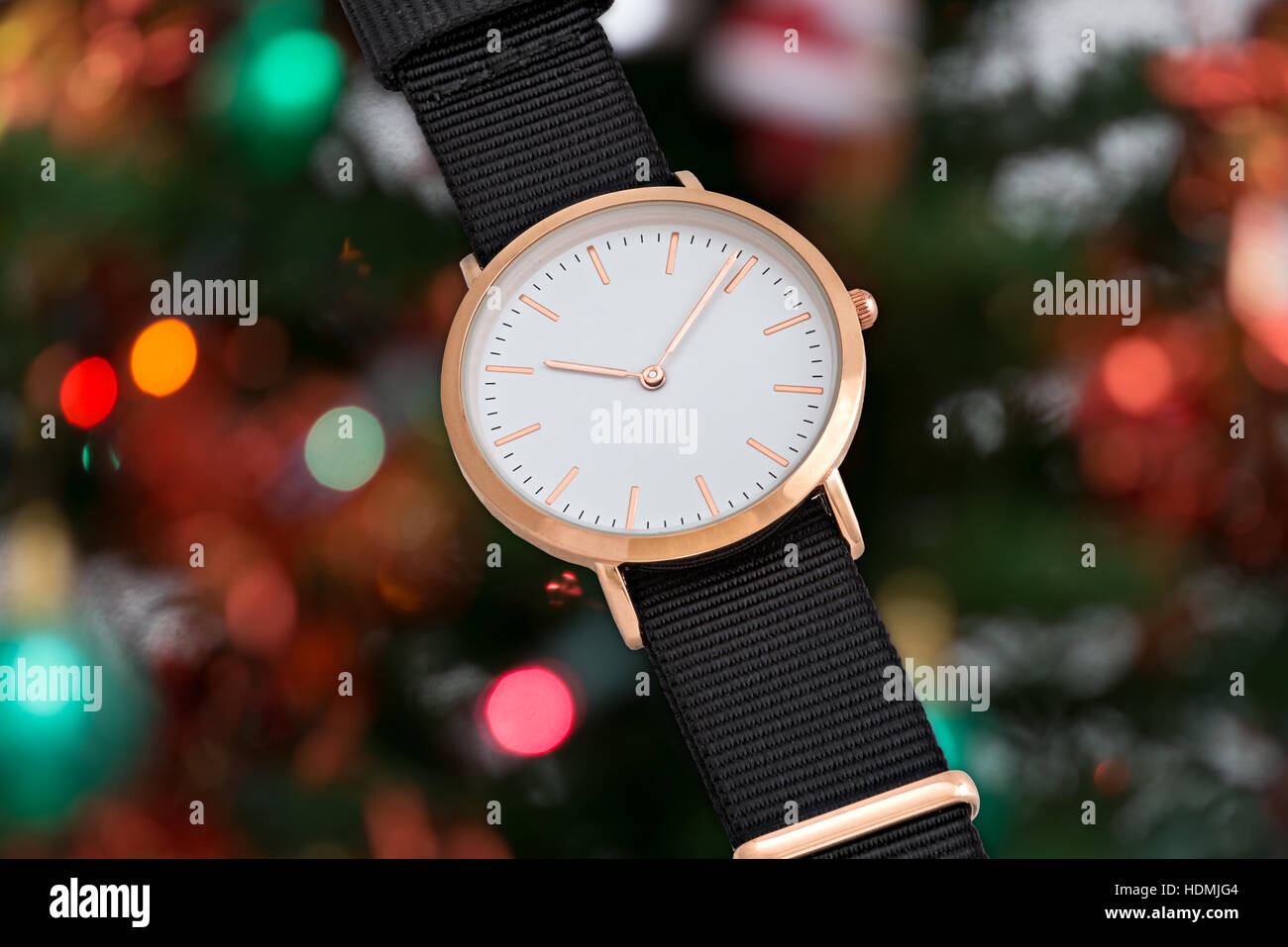 Wrist watch with black nylon strap in Christmas time in front of ...