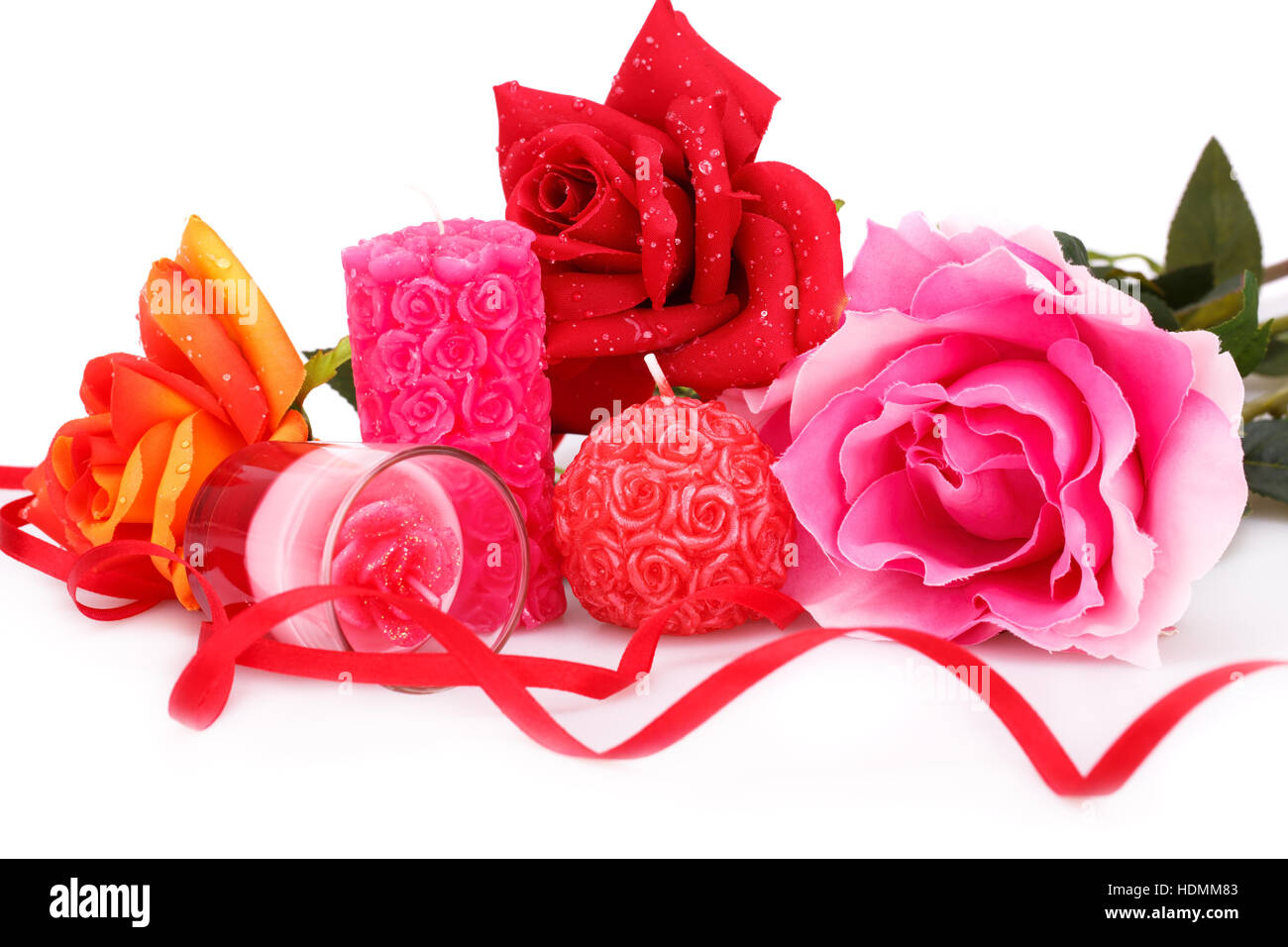 Candles and roses isolated on white background Stock Photo - Alamy