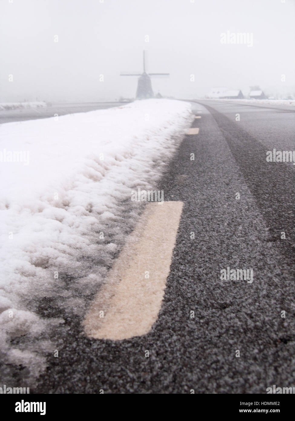 windmill in snow in Dutch winterlandscape Stock Photo - Alamy