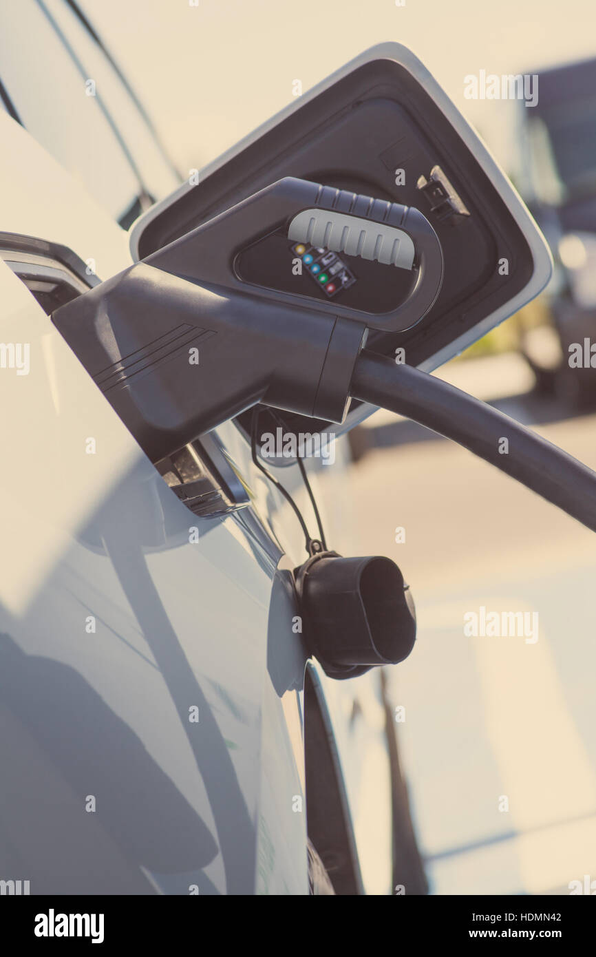 Color image of a plug used to charge an electric car Stock Photo - Alamy