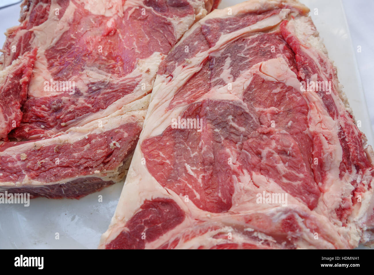 Top view of raw t-bone steak Stock Photo - Alamy