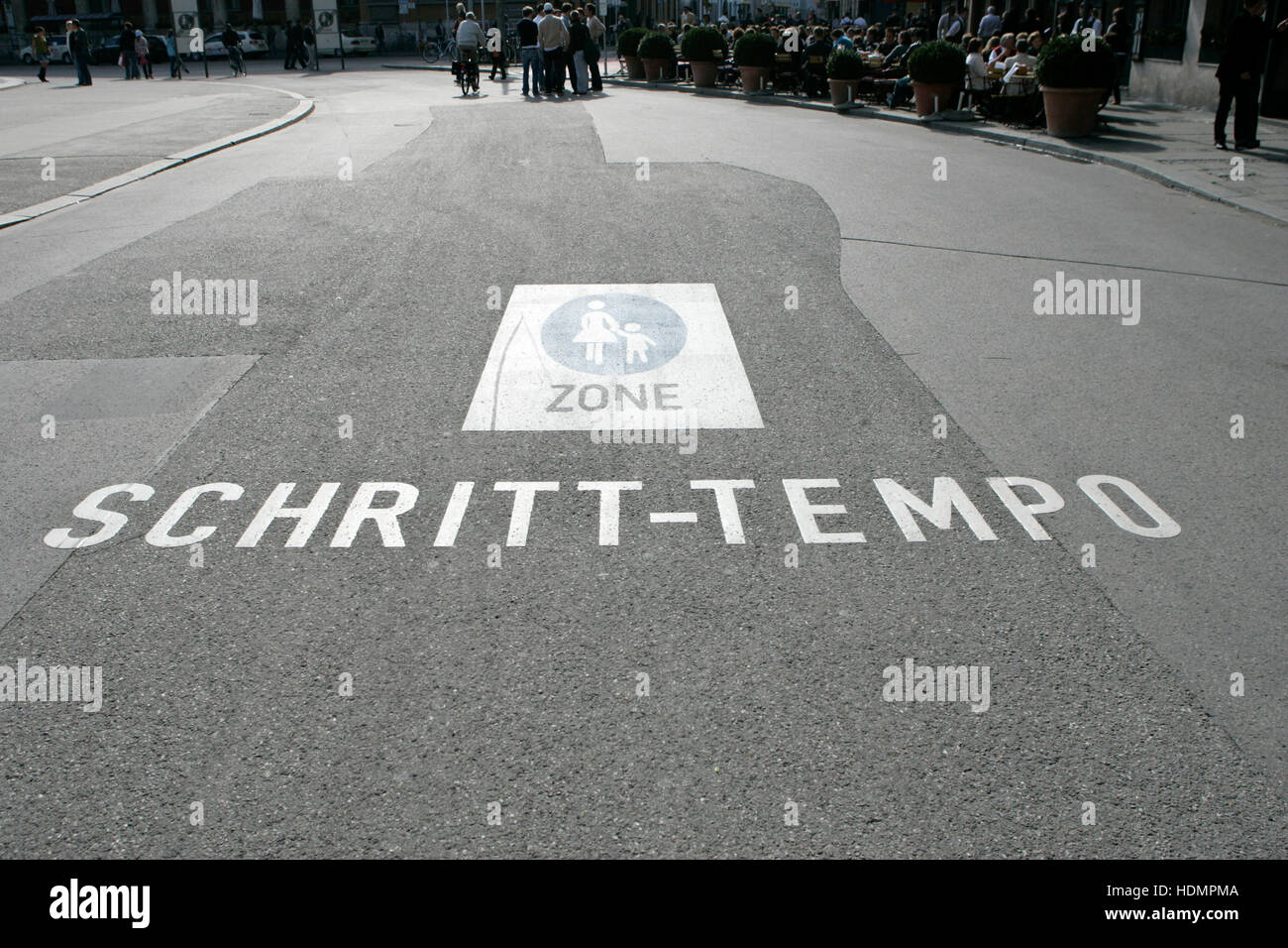 Walking speed, lettering on the road in a pedestrianised area in Munich ...