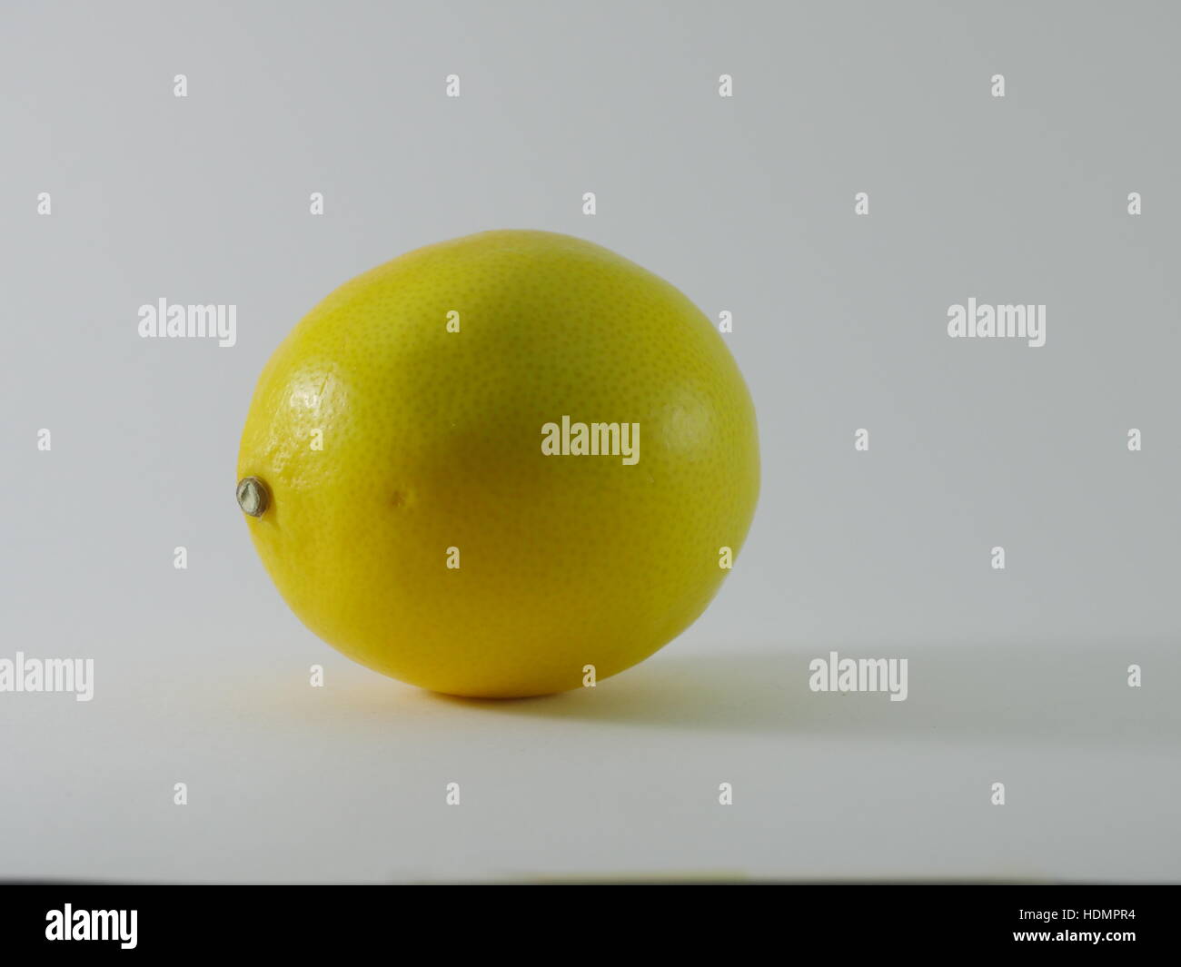 Isolated lemon in a studio Stock Photo - Alamy