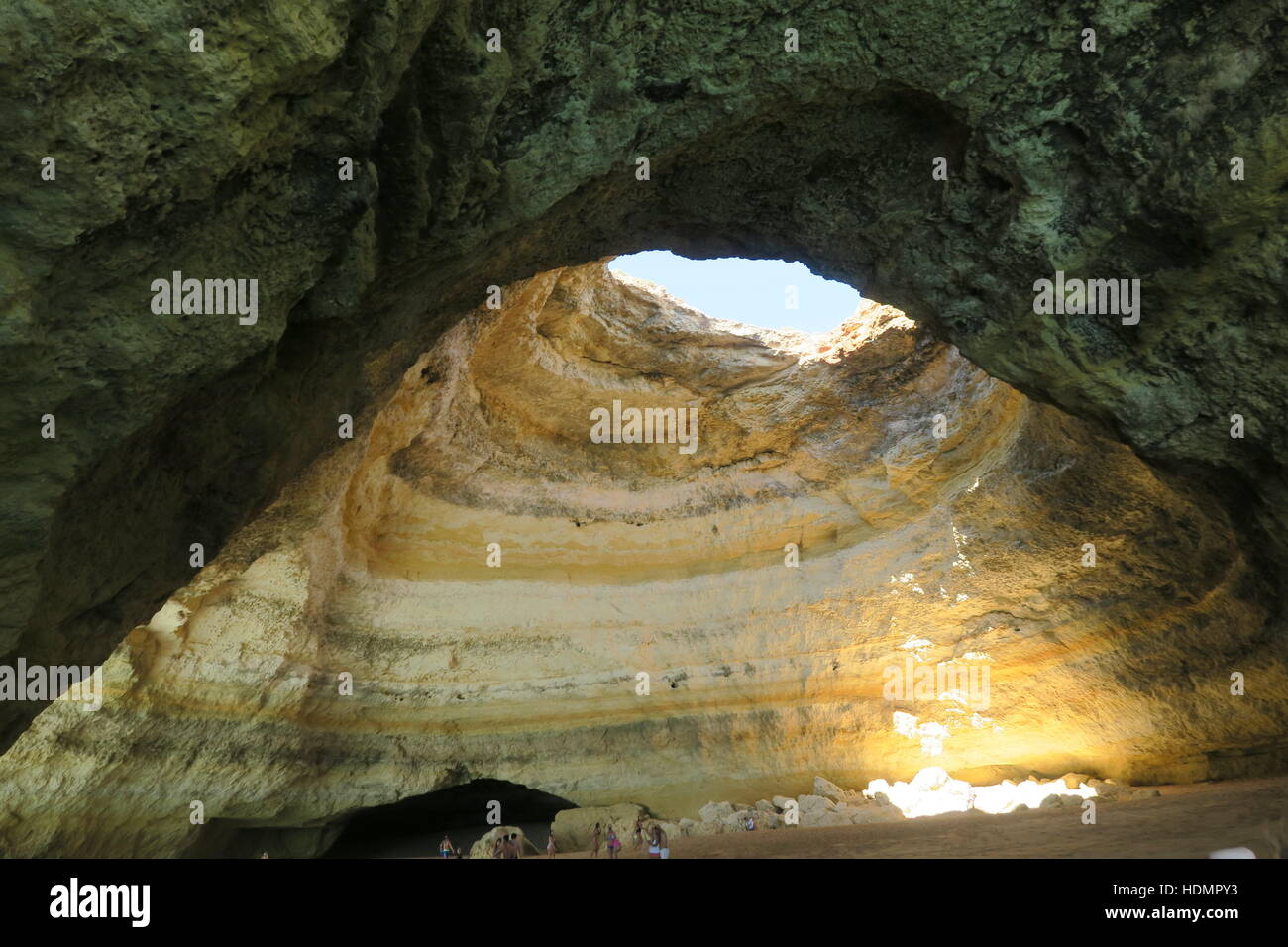 Cave at Praia do Benagil with hole and beach inside Stock Photo - Alamy