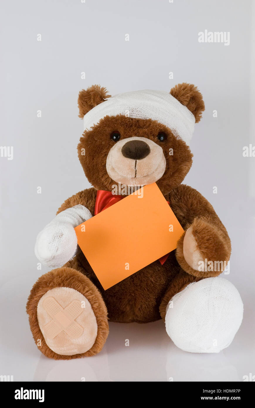 Injured toy bear, symbolic picture Stock Photo - Alamy