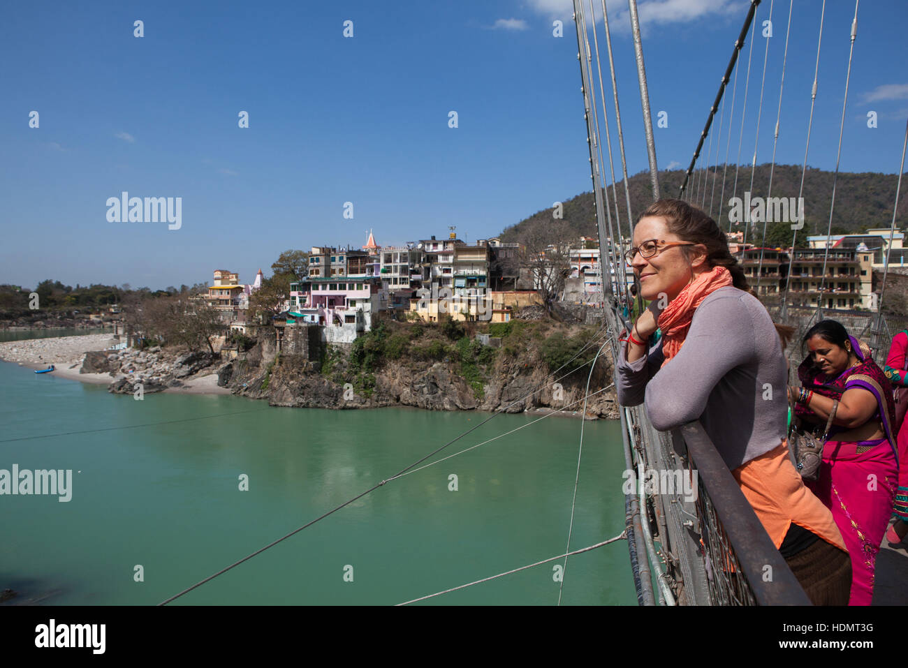 Tourist looking from Ganges River bridge in Rishikesh, Uttarakhand ...