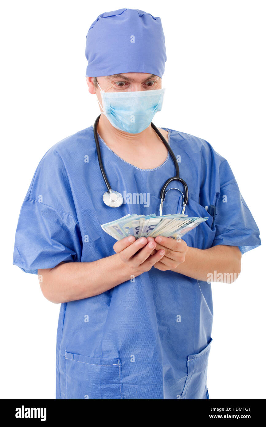 Happy male doctor holding money, isolated Stock Photo - Alamy