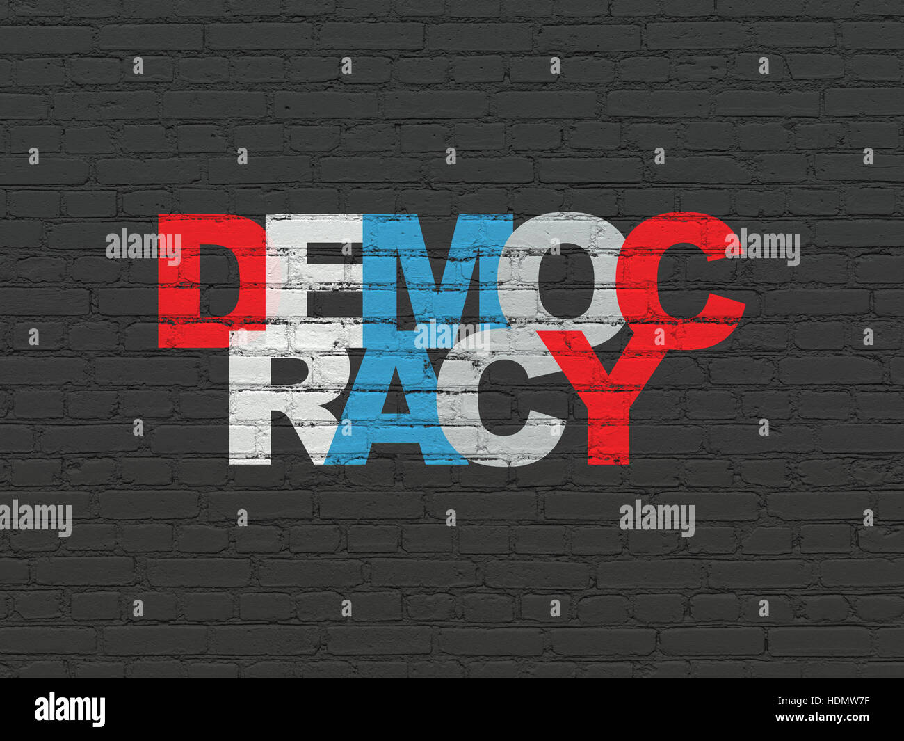Political concept: Democracy on wall background Stock Photo - Alamy