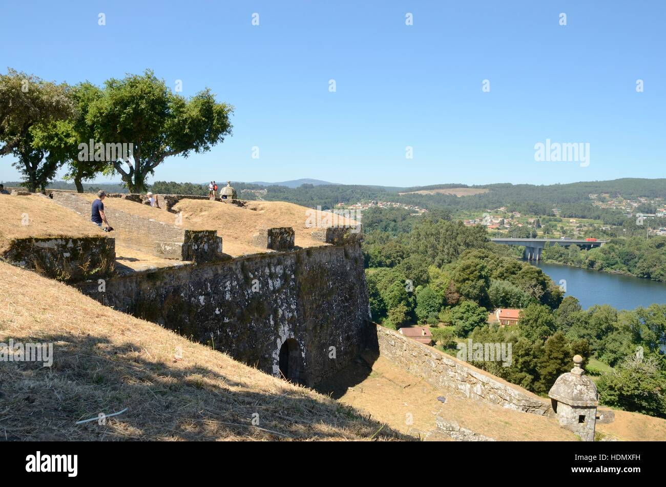 People at the fortress in the village of Valenca, a town located in the ...