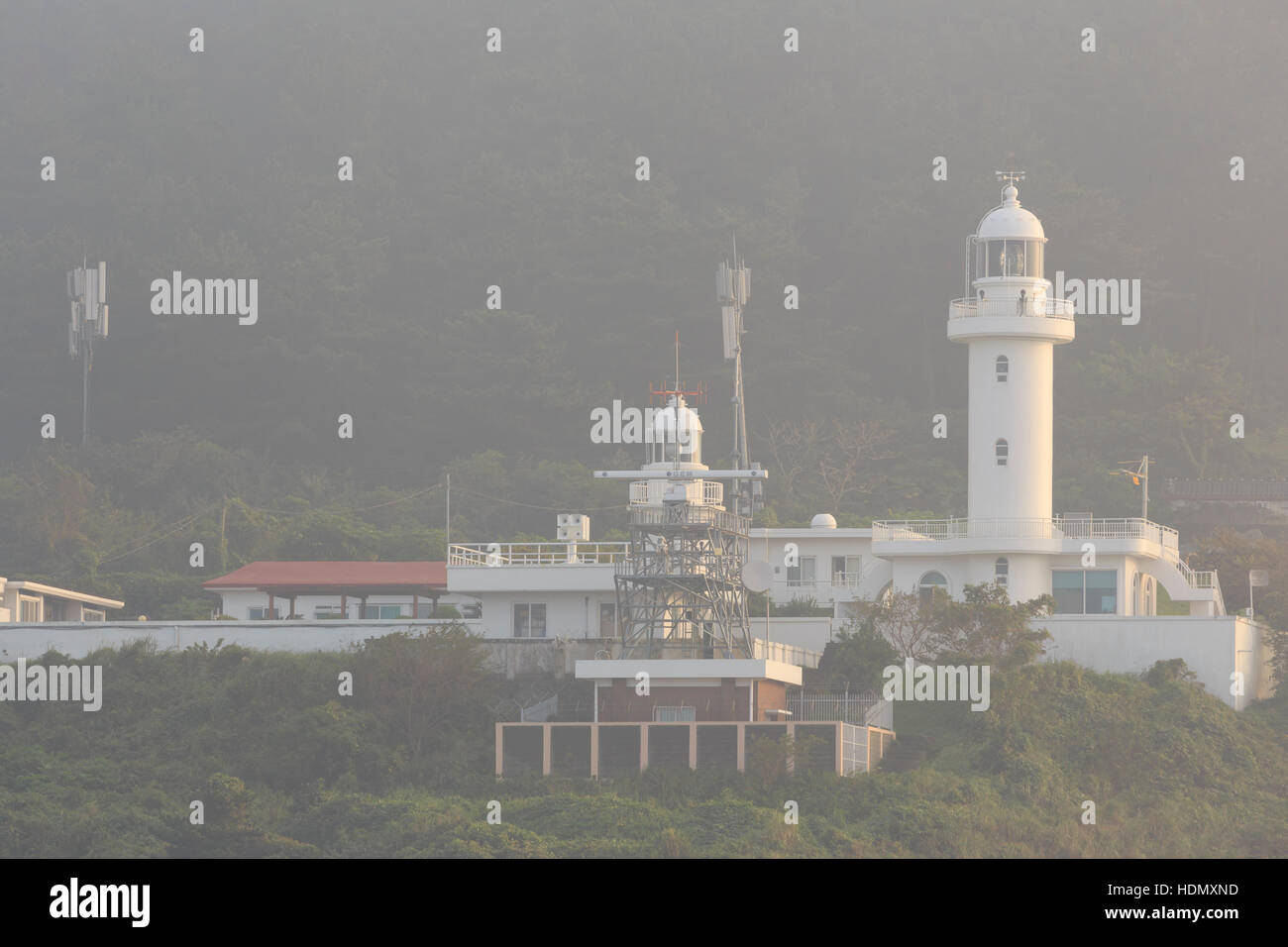 Sanji Lighthouse in fog, Jeju City, Jeju Island, South Korea, Asia ...