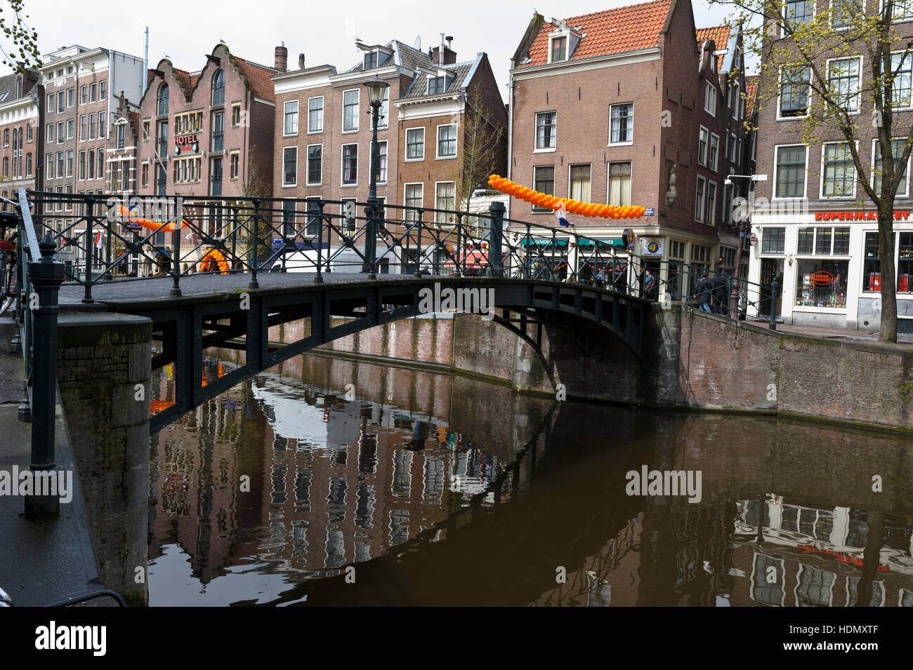 A small bridge across a canal in Amsterdam, Holland, Netherlands Stock ...