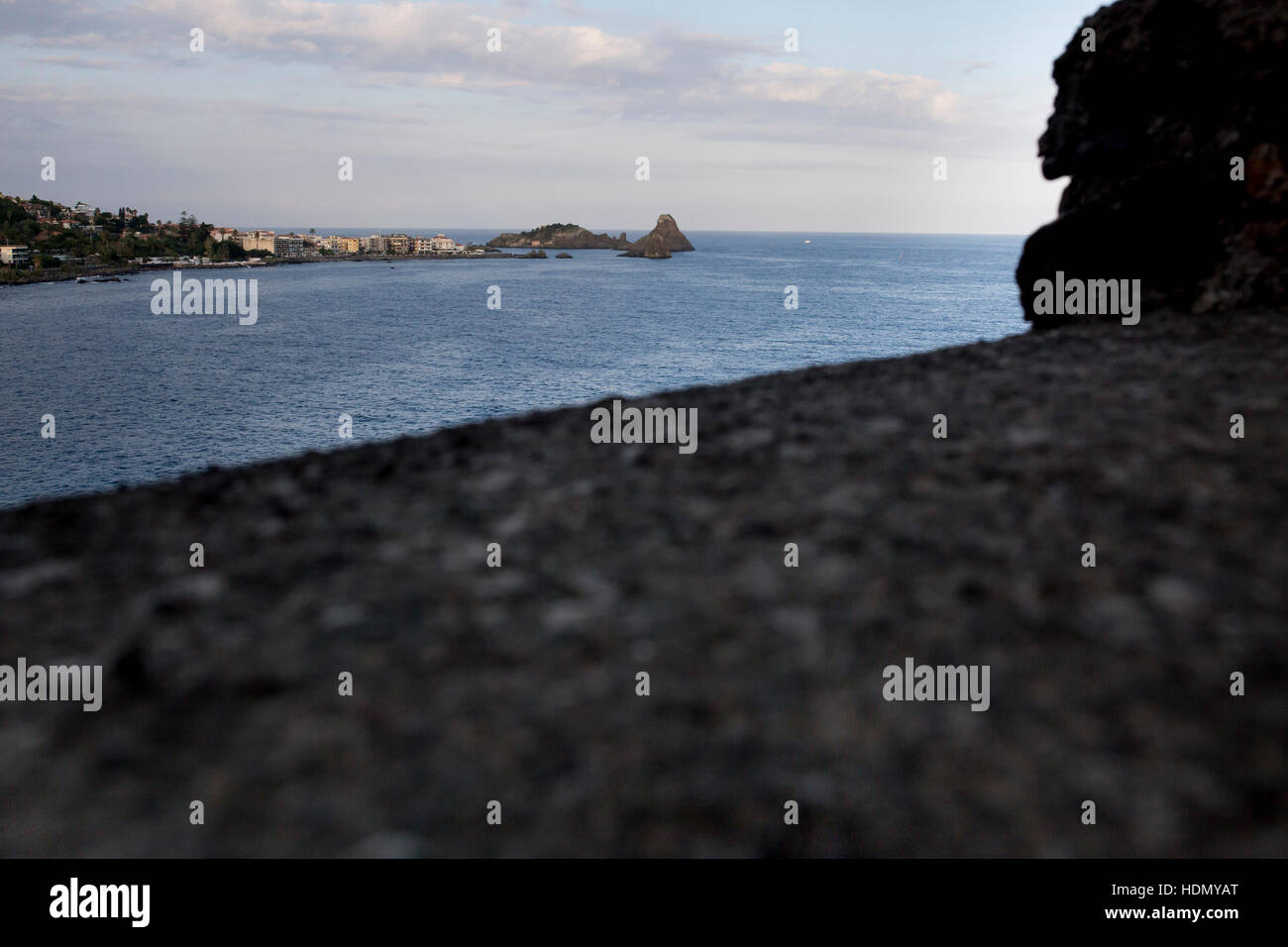 Deep blue sea waves splashing volcanic rocks, Catania, Sicily coast ...