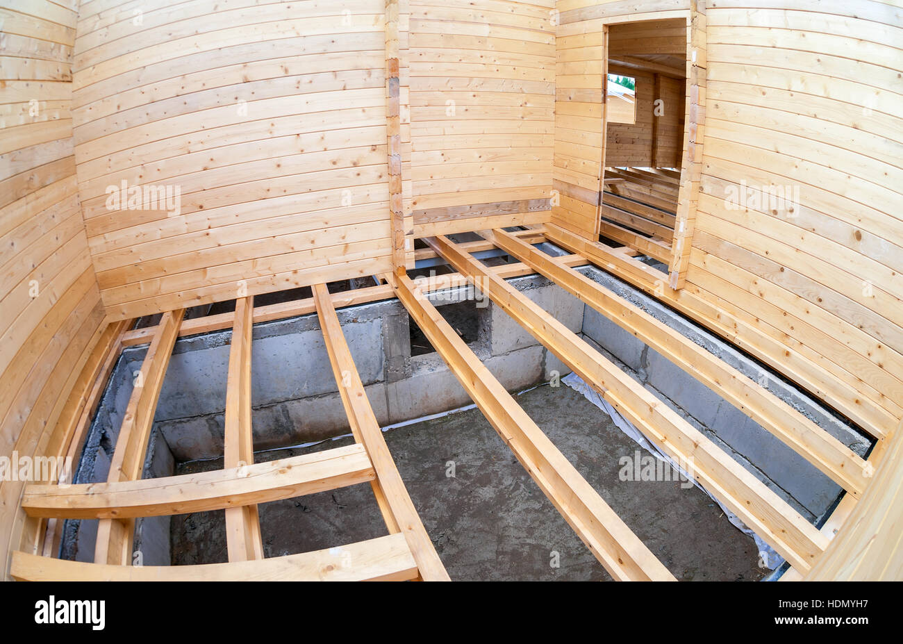 Construction of a new wooden house. Inside view Stock Photo - Alamy