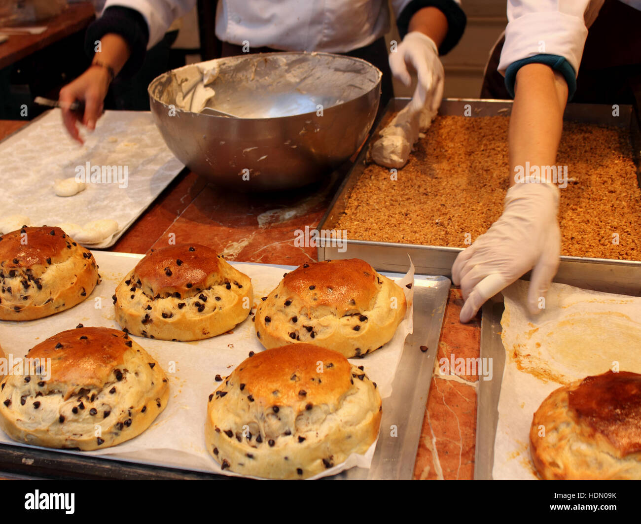 View of Bake shop or bakery baker with people working Stock Photo - Alamy