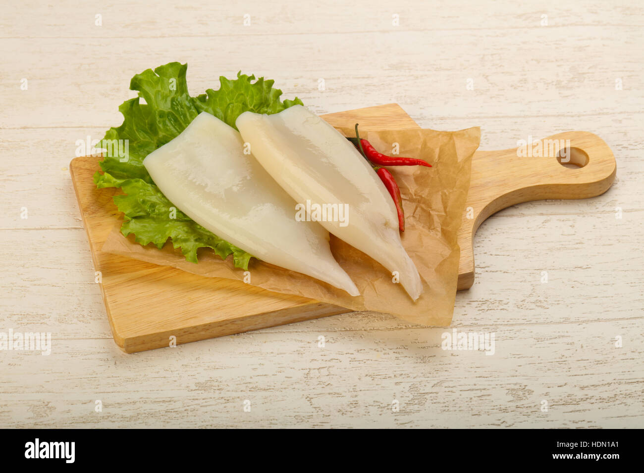Raw squid fillet ready for cooking Stock Photo - Alamy