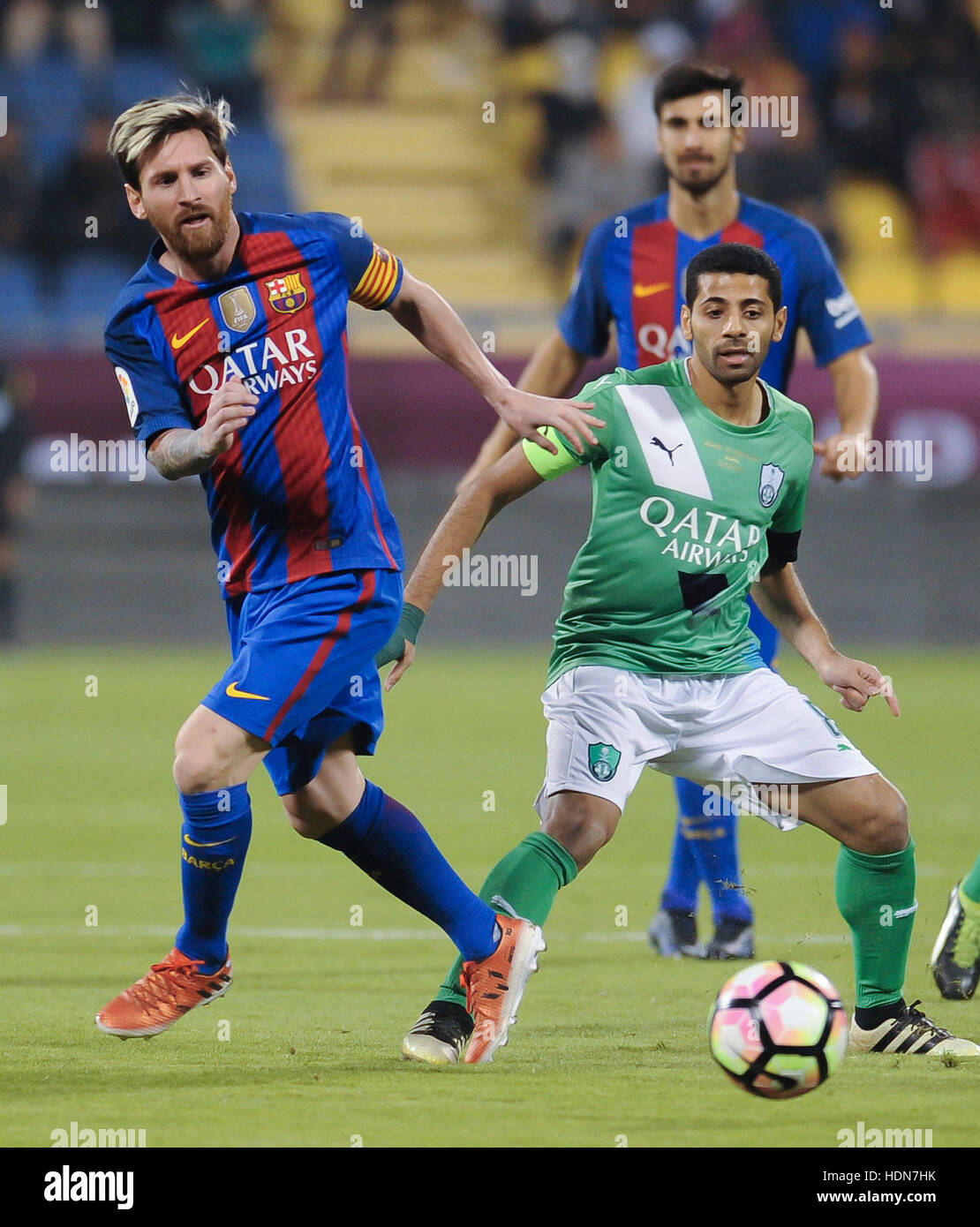 Doha, Qatar. 13th Dec, 2016. Barcelona's Lionel Messi (L) vies for the ...