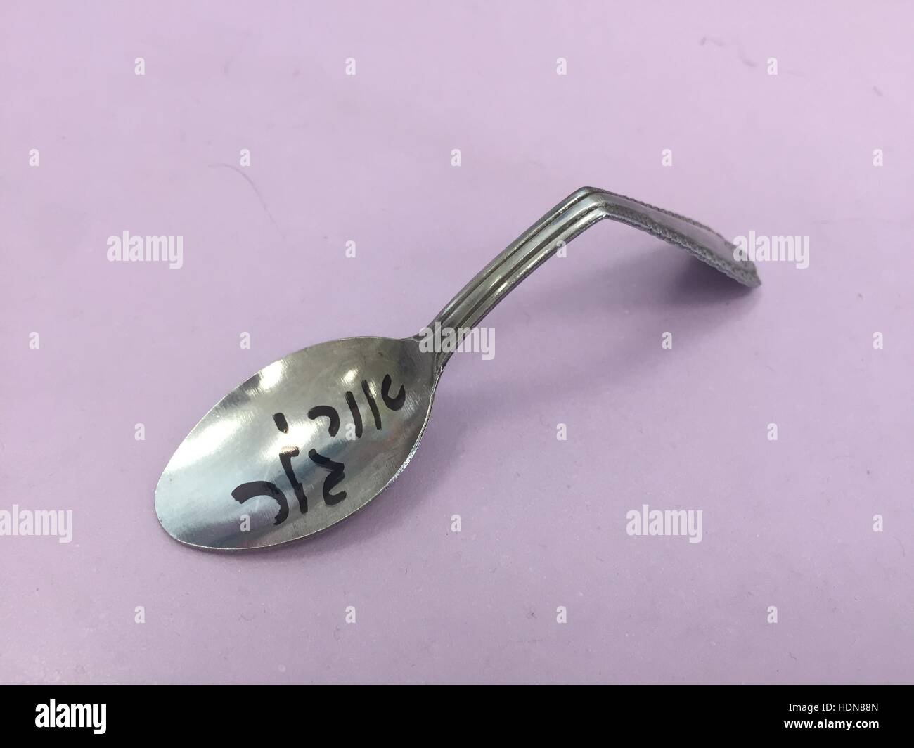 Uri geller spoon hi-res stock photography and images - Alamy