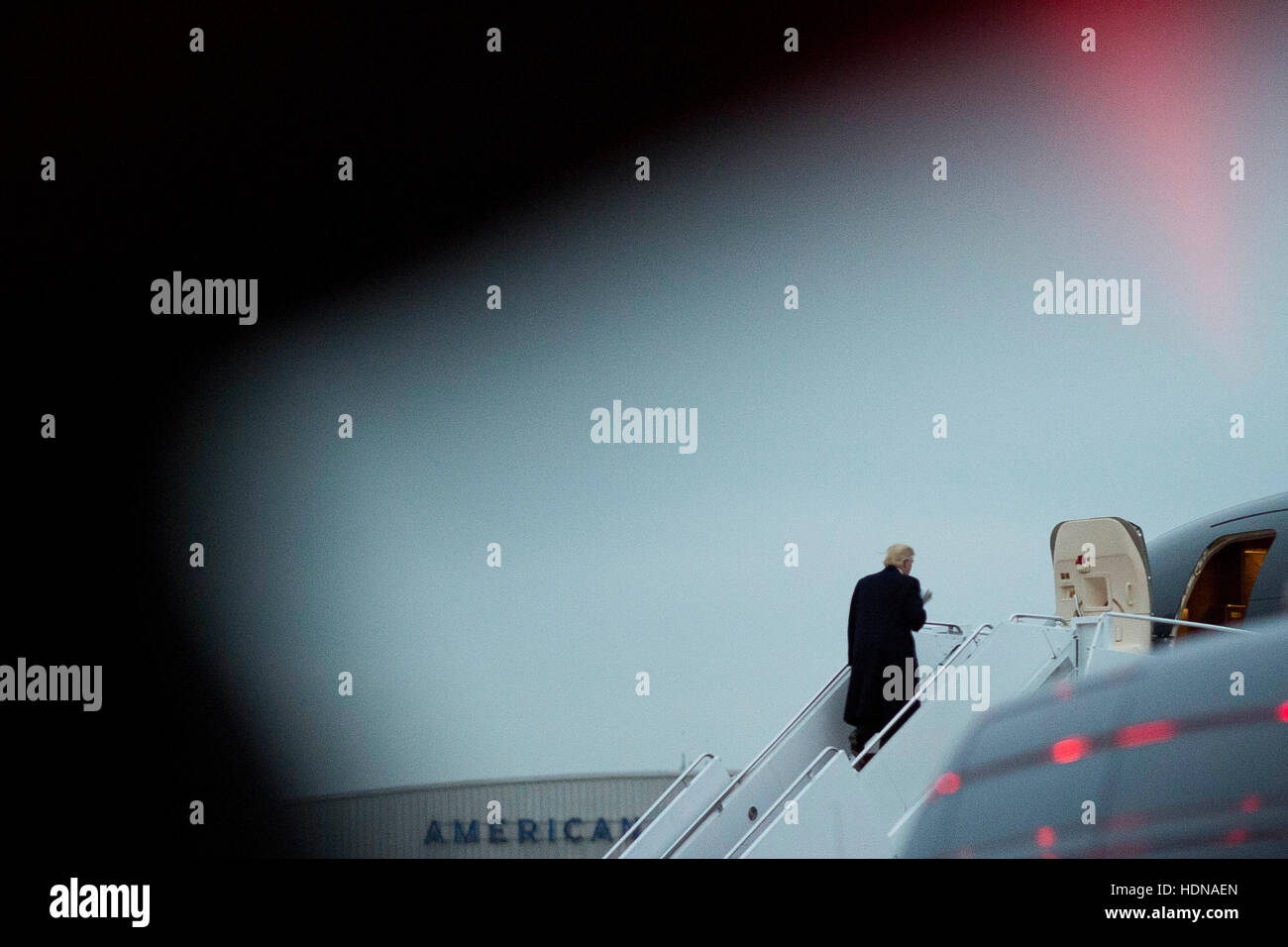 United States President-elect Donald J. Trump boards his plane at ...