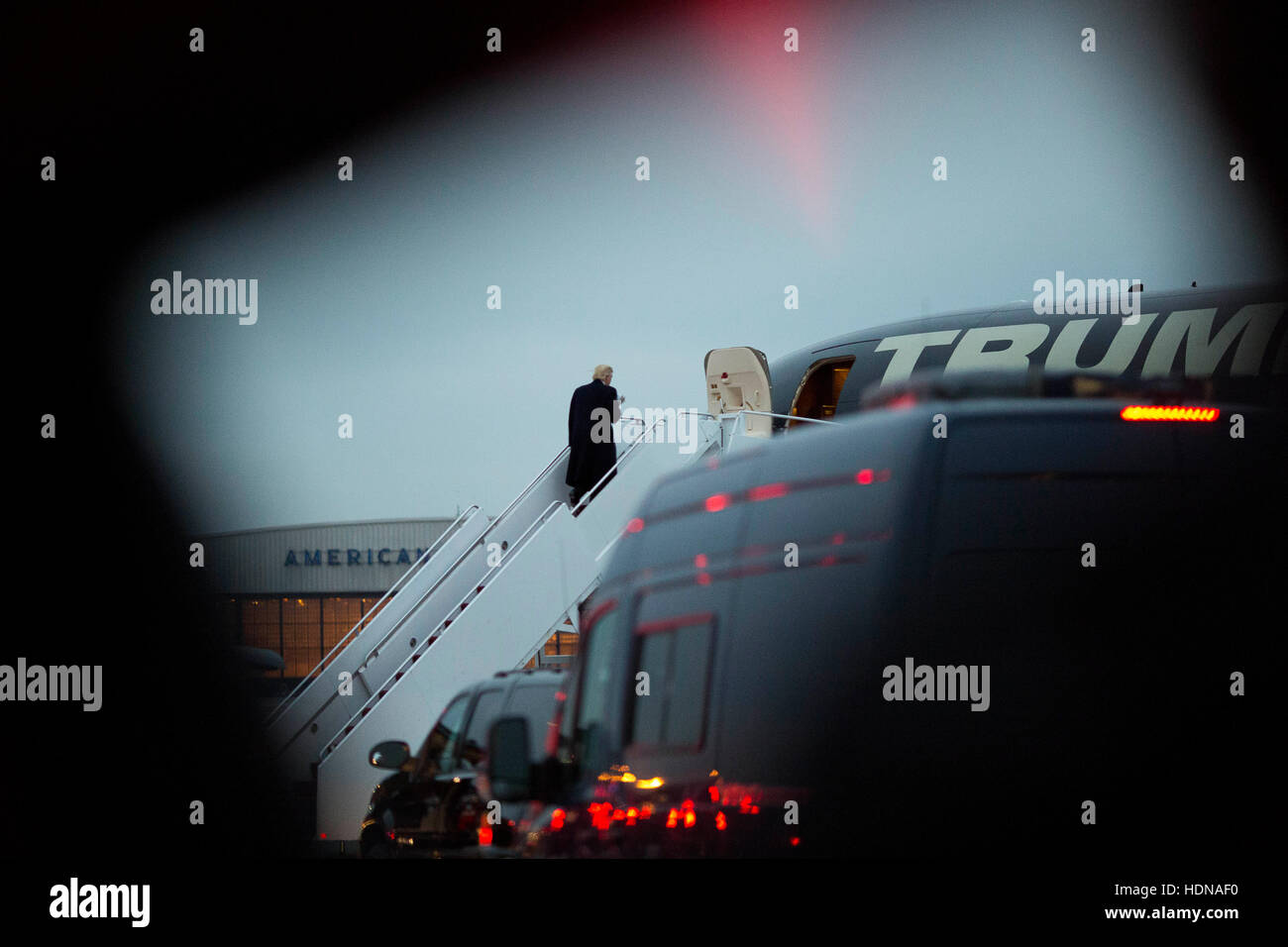 United States President-elect Donald J. Trump boards his plane at ...