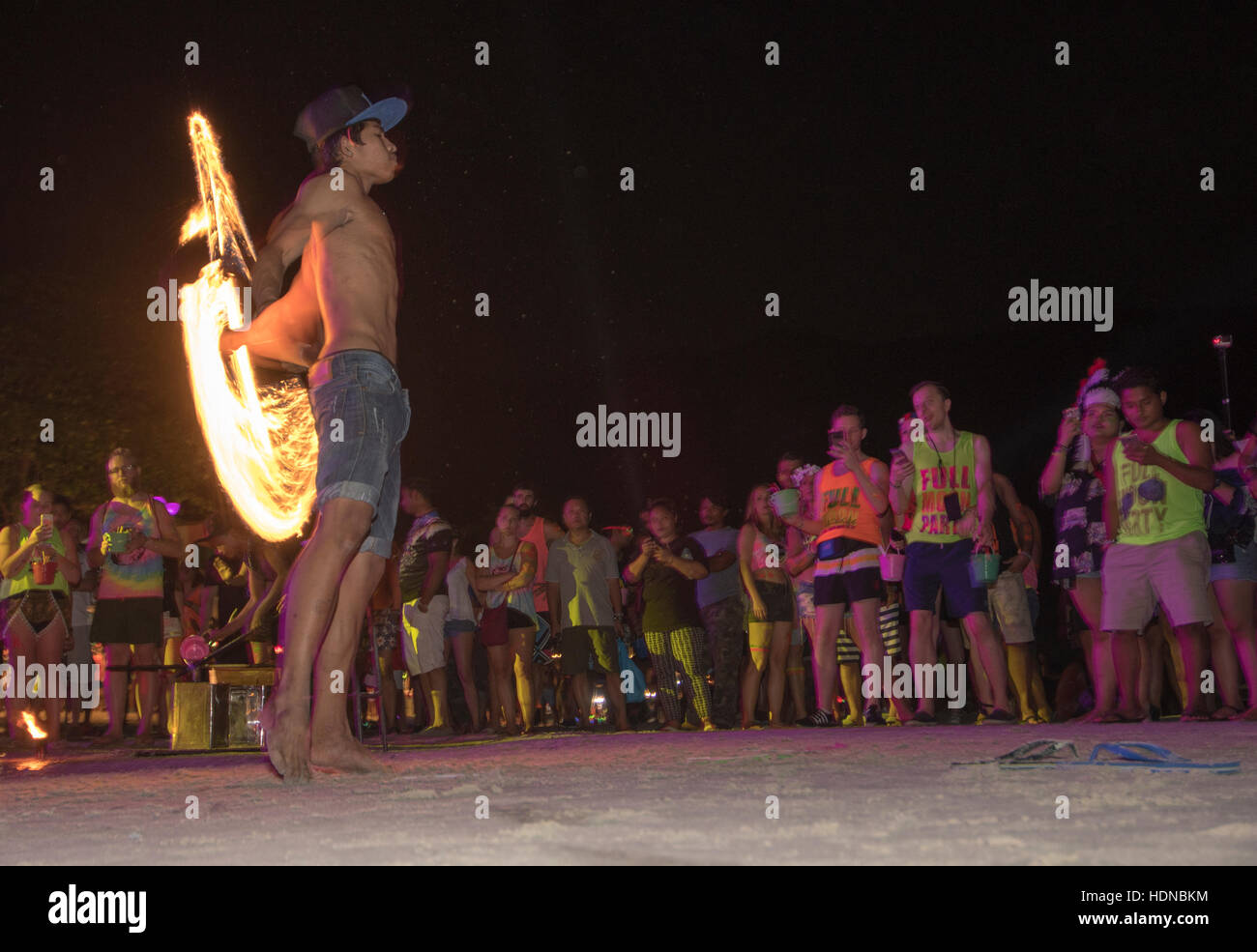 A display of fire dancing at a Full Moon party on Sunrise beach Haad ...
