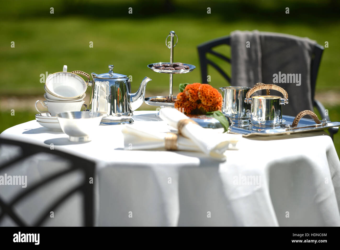 Afternoon tea outside with silver service Stock Photo - Alamy