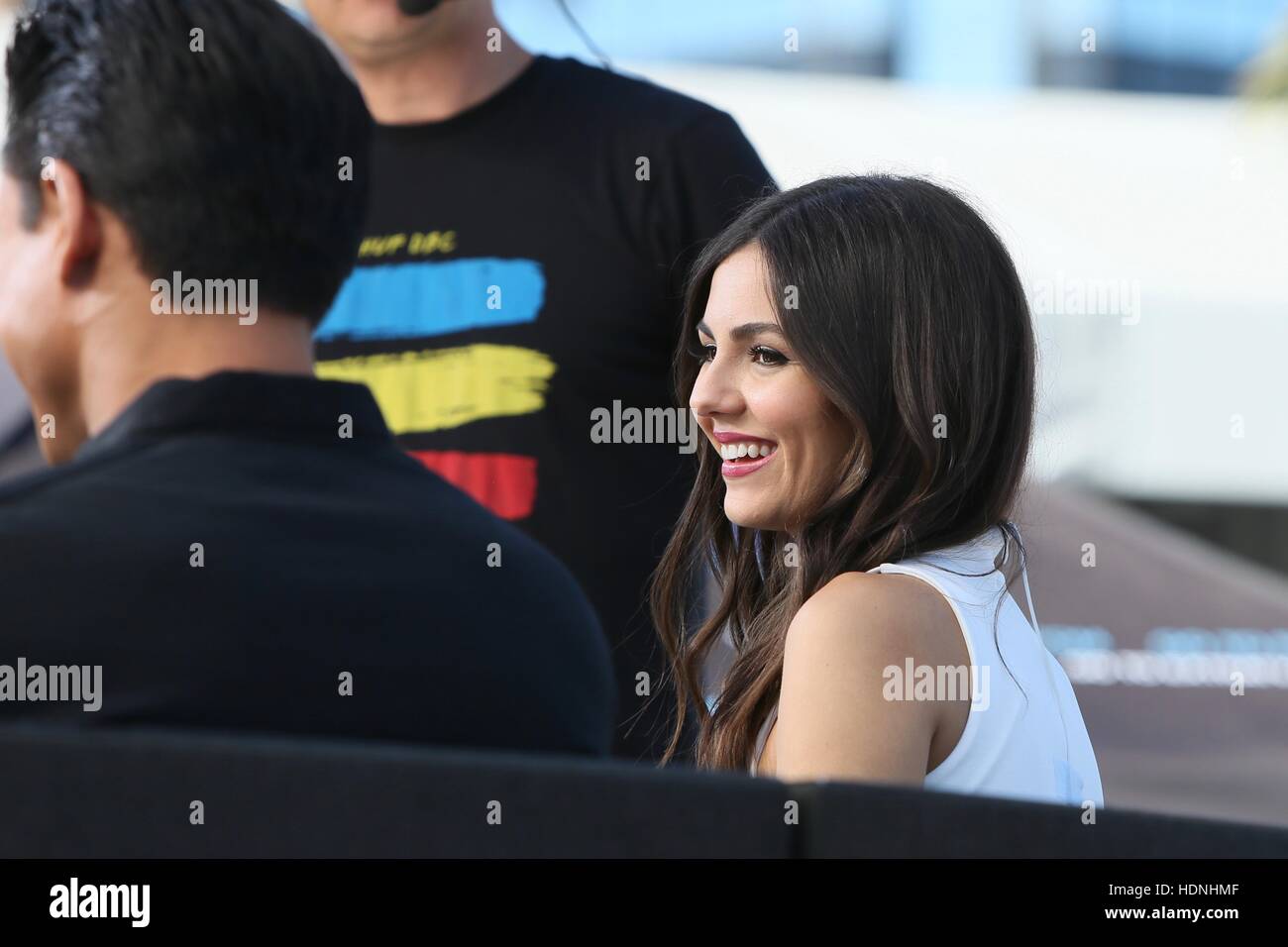Victoria Justice visits Universal Studios to interview with Mario Lopez ...