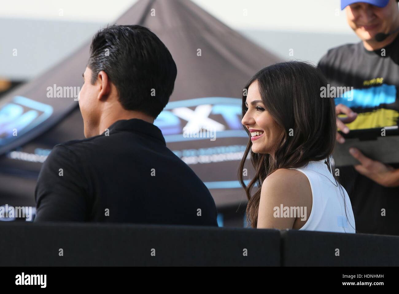 Victoria Justice visits Universal Studios to interview with Mario Lopez ...
