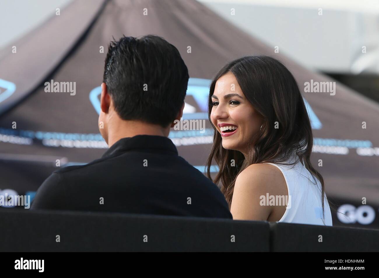 Victoria Justice visits Universal Studios to interview with Mario Lopez ...