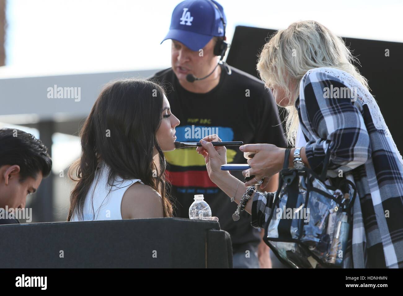 Victoria Justice visits Universal Studios to interview with Mario Lopez ...