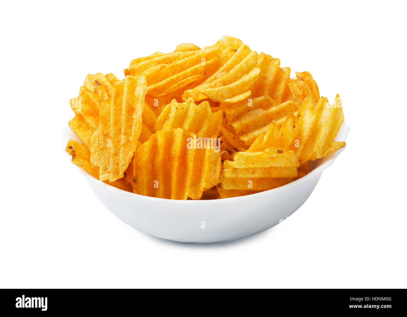 Plate of potato chips isolated on a white background Stock Photo - Alamy