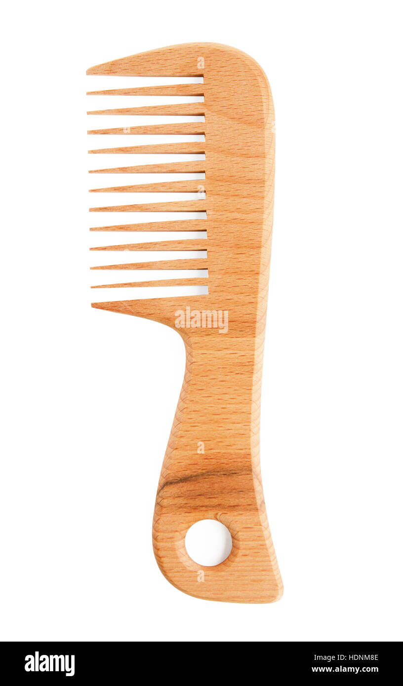 Wooden comb isolated on a white background Stock Photo - Alamy