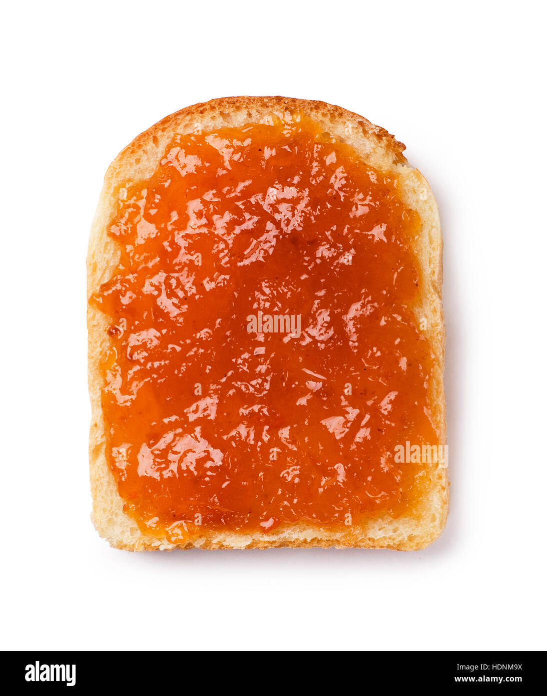 Slice of bread with homemade apricot jam isolated on a white background ...
