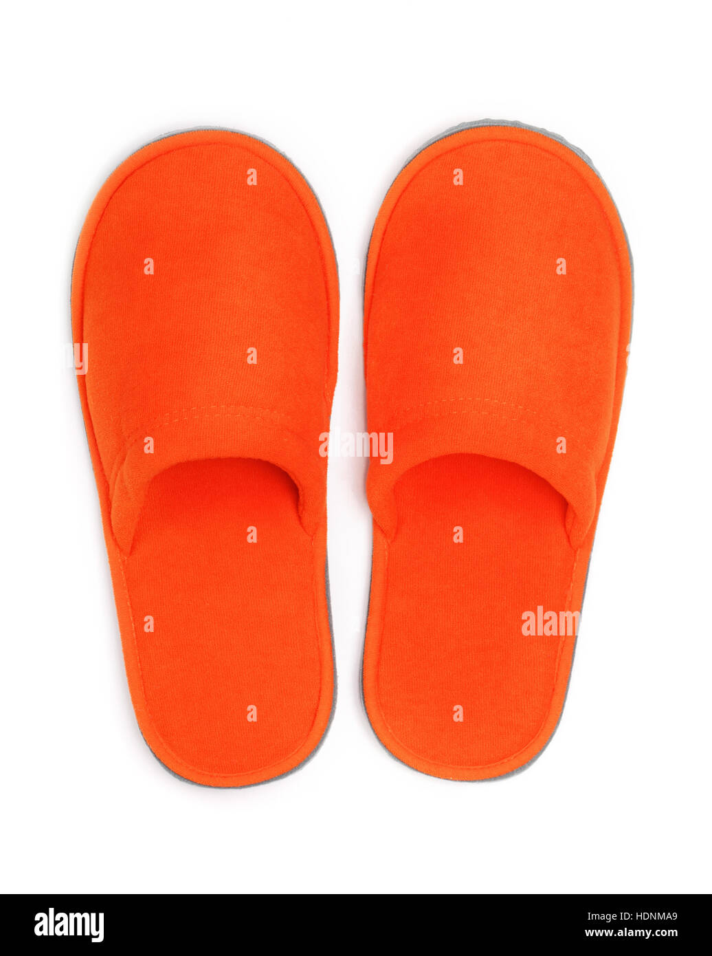 Orange house slippers isolated on white background Stock Photo - Alamy