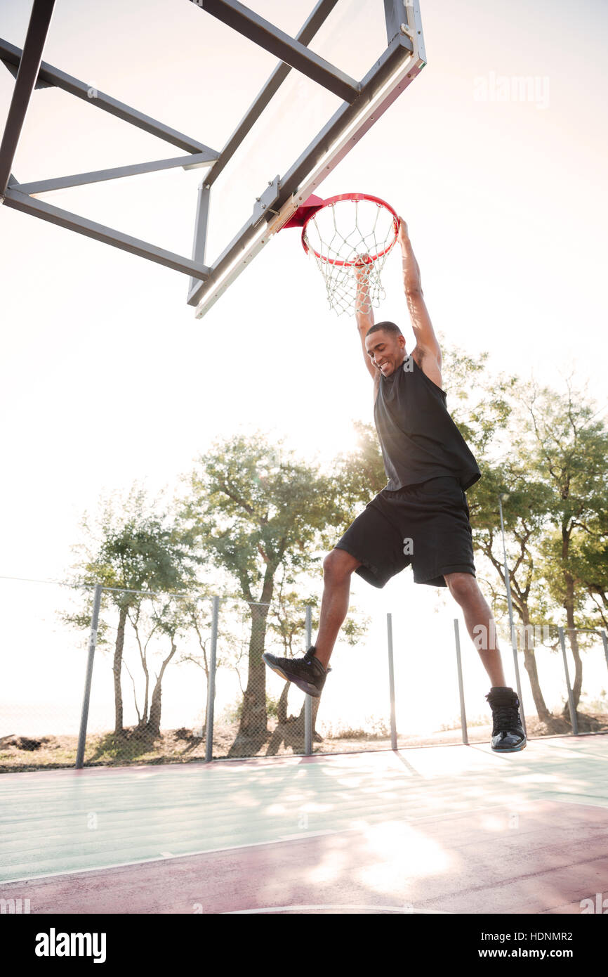 Image of african basketball player practicing for basketball. Looking ...