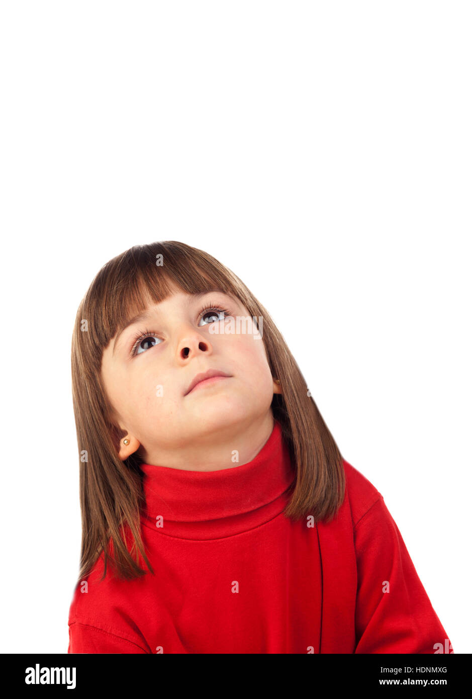 Happy small girl looking up isolated on a white background Stock Photo ...