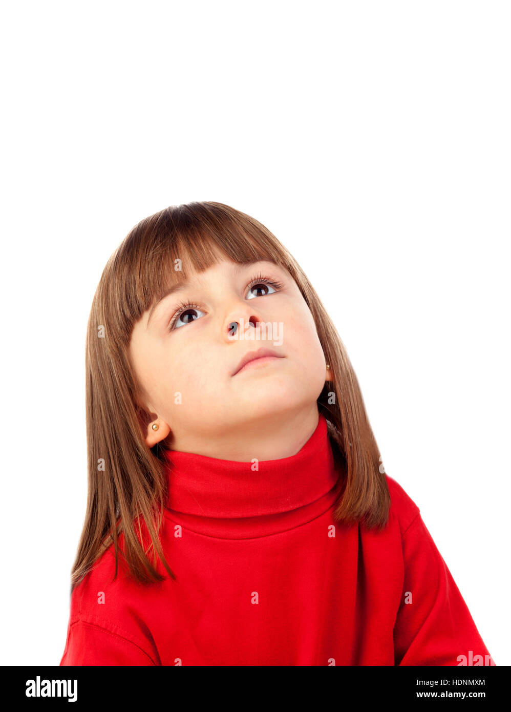 Happy small girl looking up isolated on a white background Stock Photo ...
