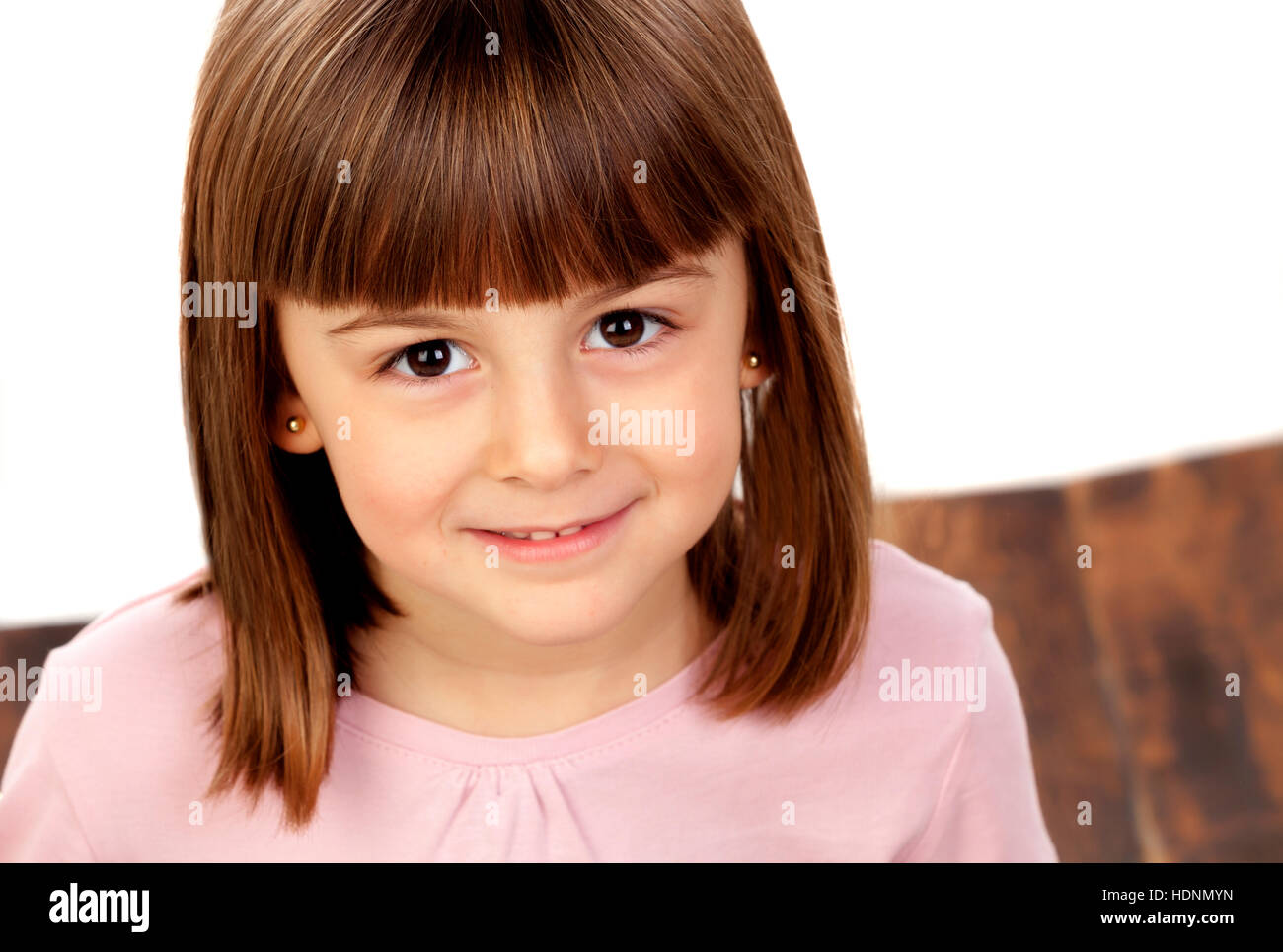 Happy small girl smiling isolated on a white background Stock Photo - Alamy