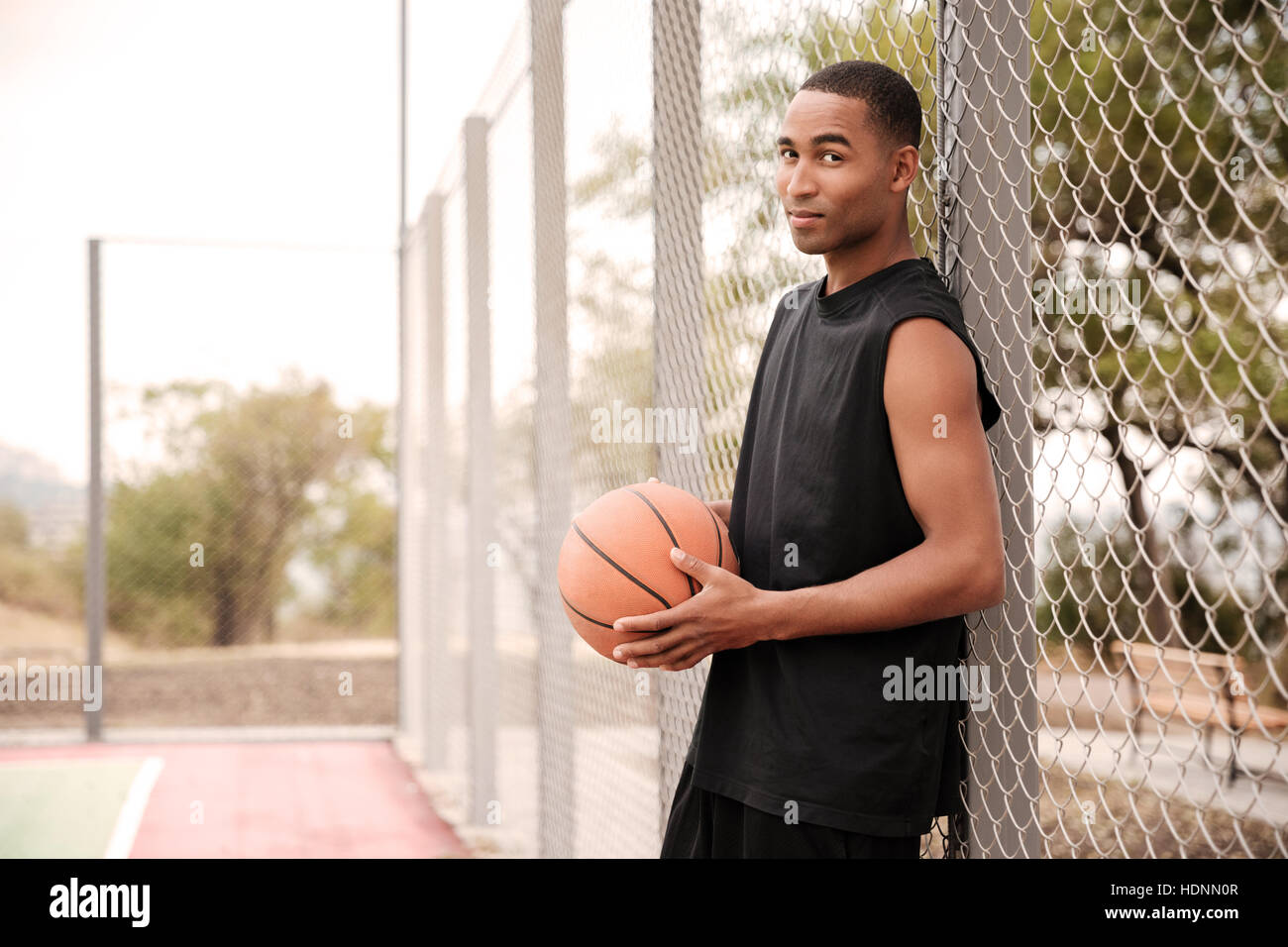 Black basketball player standing in hi-res stock photography and images ...