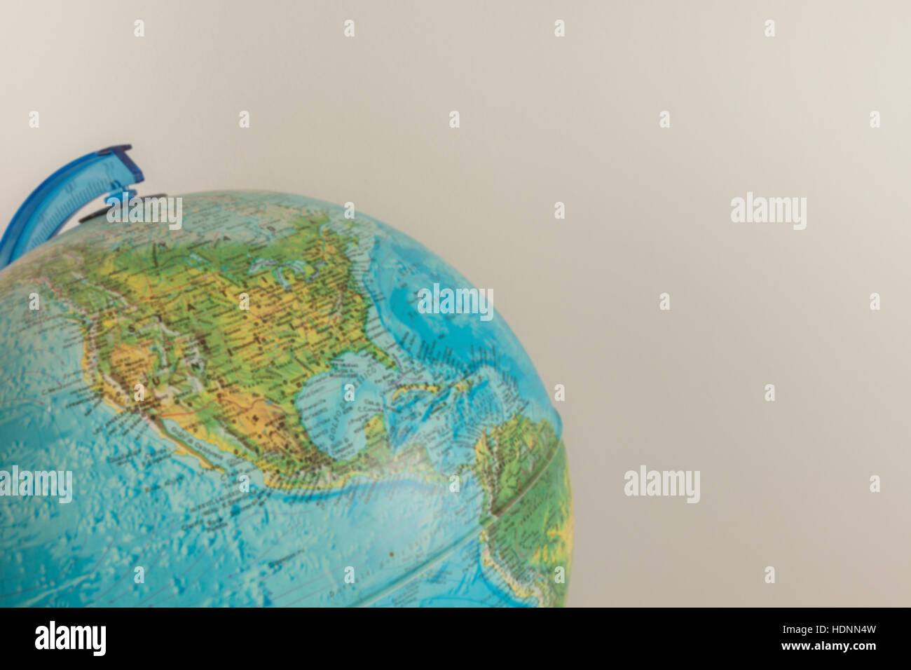 OUT OF FOCUS: Globe with physical map on it Stock Photo - Alamy