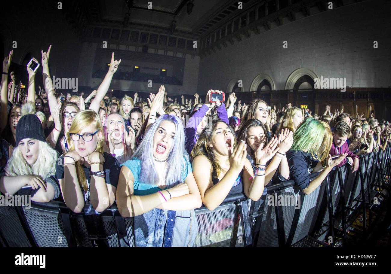 Fans watching You Me at Six perform live on stage at the O2 Guildhall ...