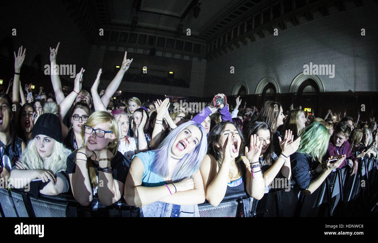 Fans watching You Me at Six perform live on stage at the O2 Guildhall ...
