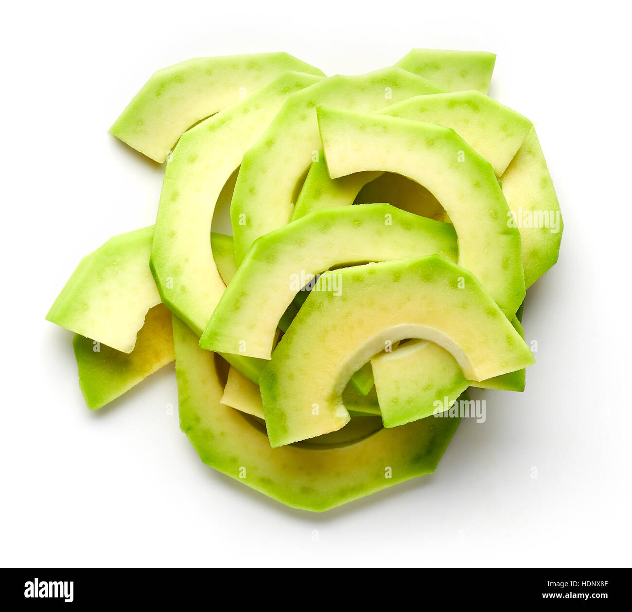 Heap of fresh avocado slices isolated on white background, top view ...