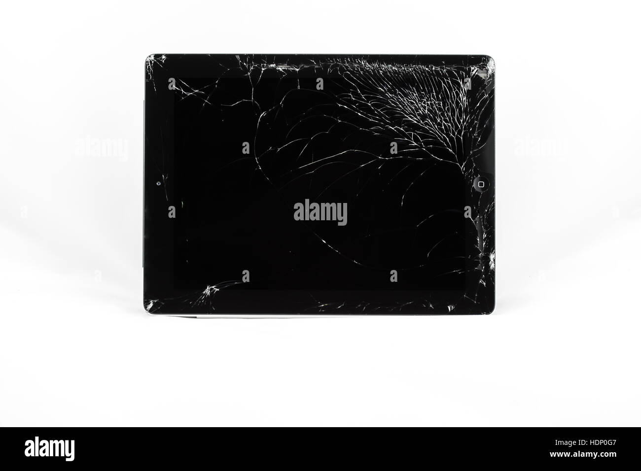 A harshly broken tablet after a fall Stock Photo - Alamy